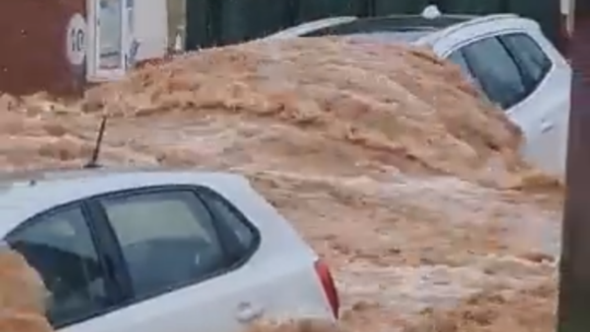 Heavy rainfall washes away cars in Spain as emergency services ...