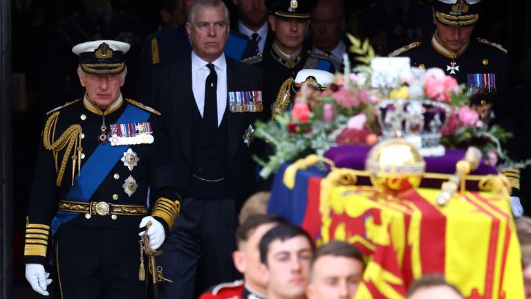 Britain's King Charles and Britain's Prince Andrew attend the state ...