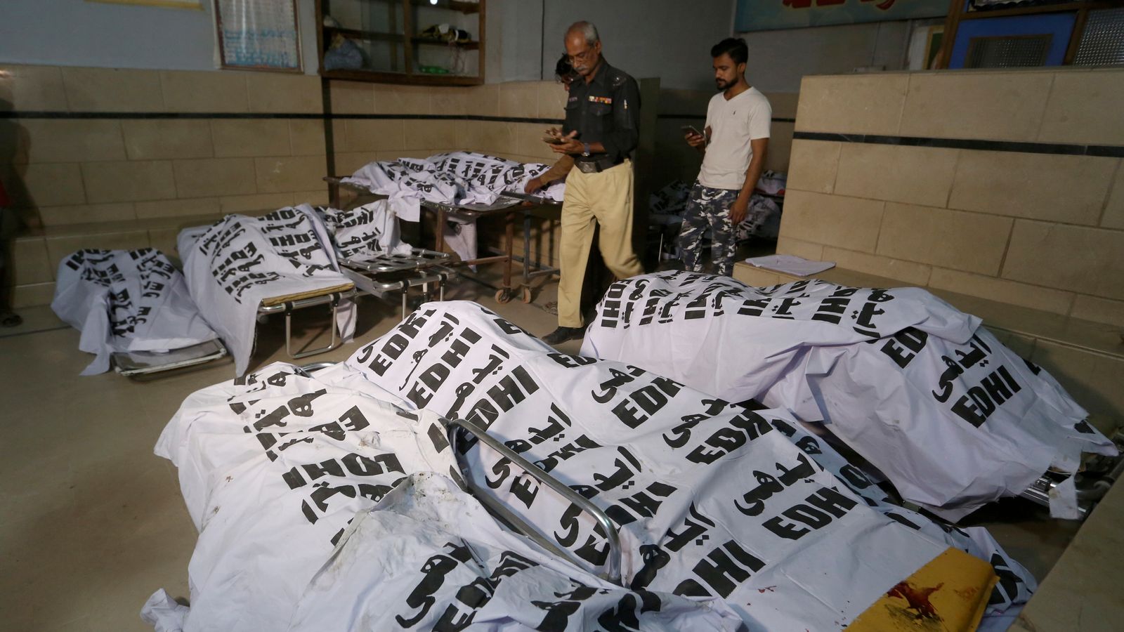 Eight children among 18 flood survivors who died in Pakistan bus fire ...