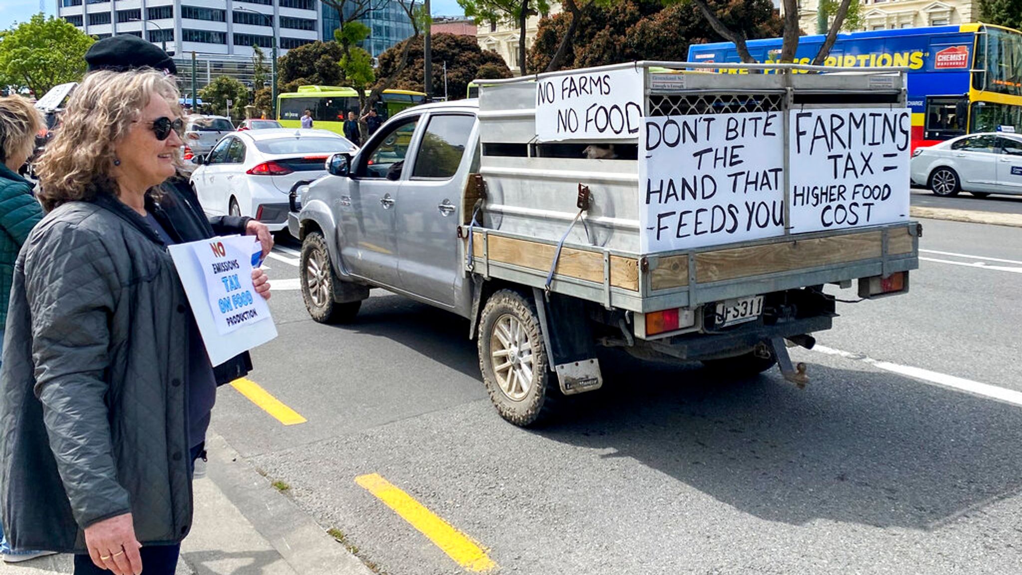 New Zealand farmers drive tractors on motorways to protest 'burp tax ...