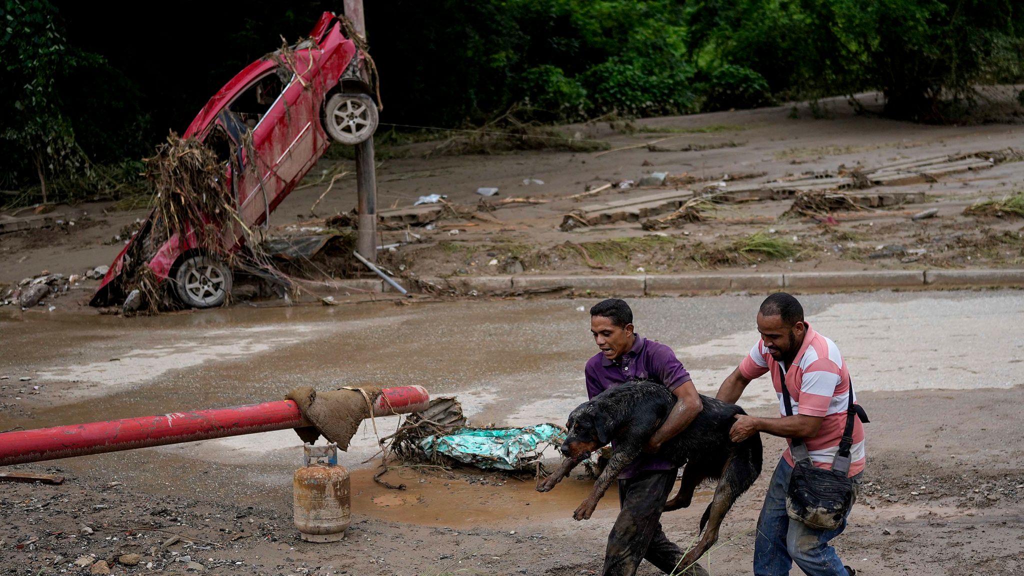 At least 25 killed as landslide caused by floods tears through ...