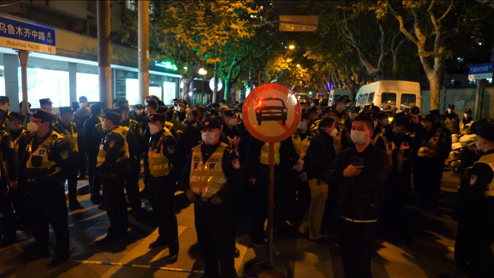 Rare street protests in China as police charge in | World News | Sky News