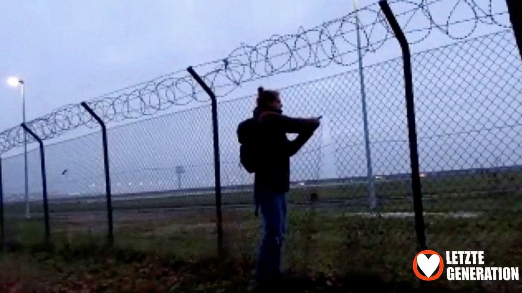 Climate activists glue themselves to runway at Berlin airport | World ...