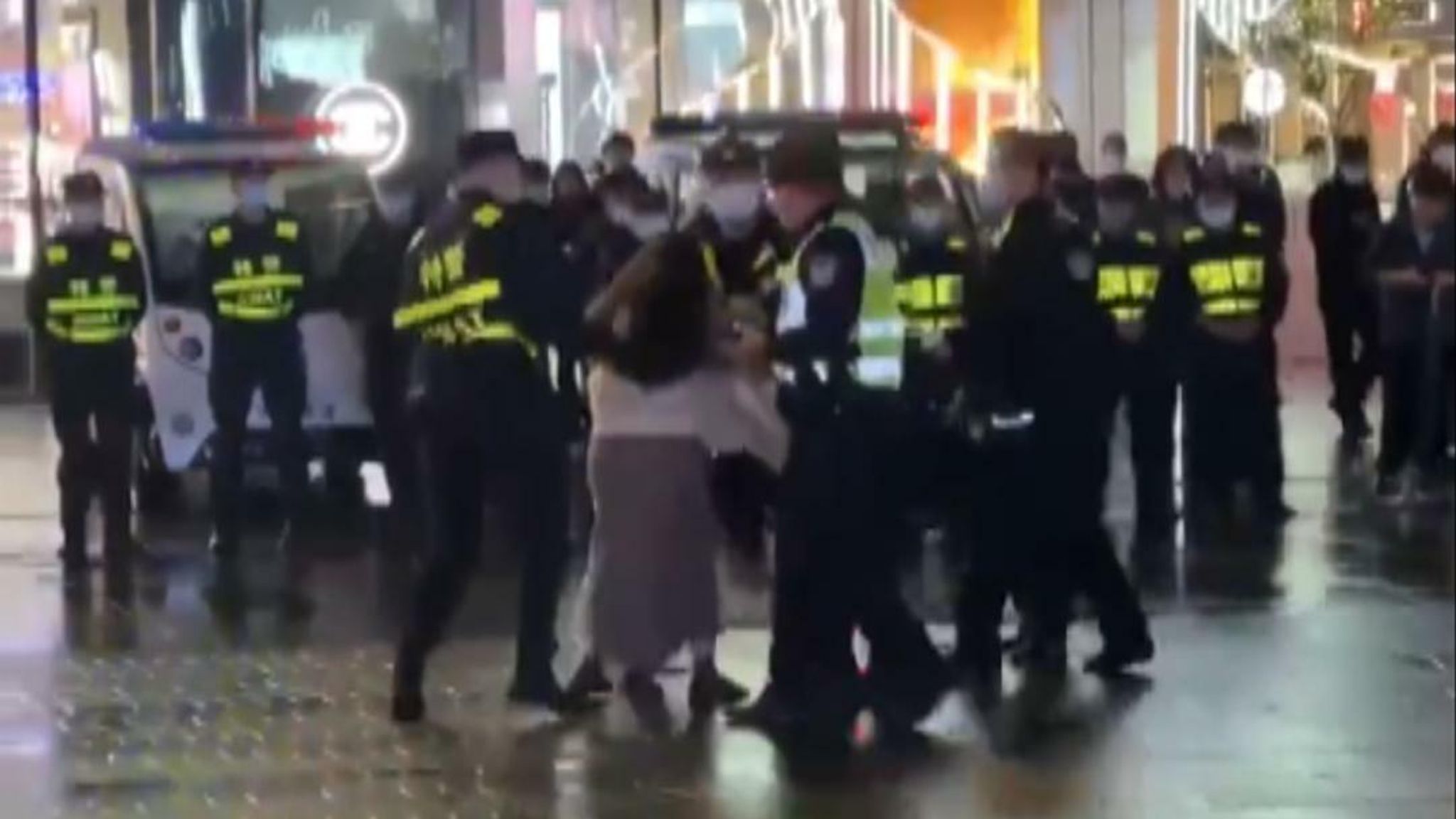 China protests paused as police flood streets and temperatures drop ...