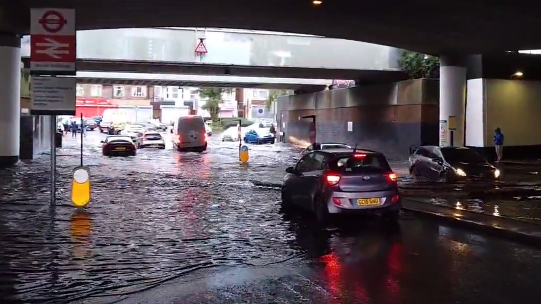 UK weather: Flooding causes road and rail disruption as heavy rainfall ...