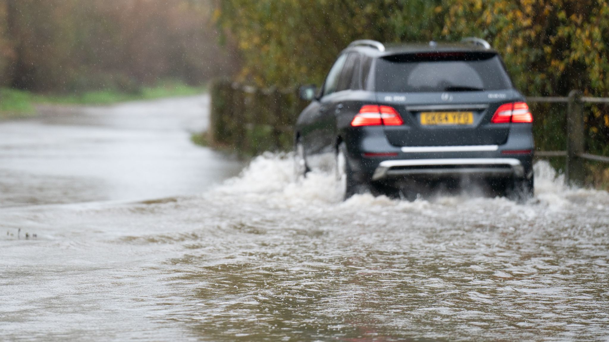 UK weather: Dozens of flood warnings in place as Britain hit with strong winds and heavy rain ...