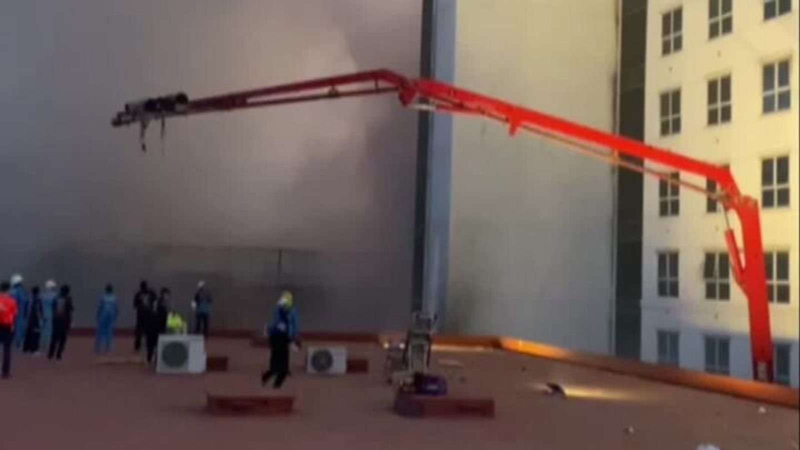 Crane rescues people during a casino fire in Cambodia. | World News ...