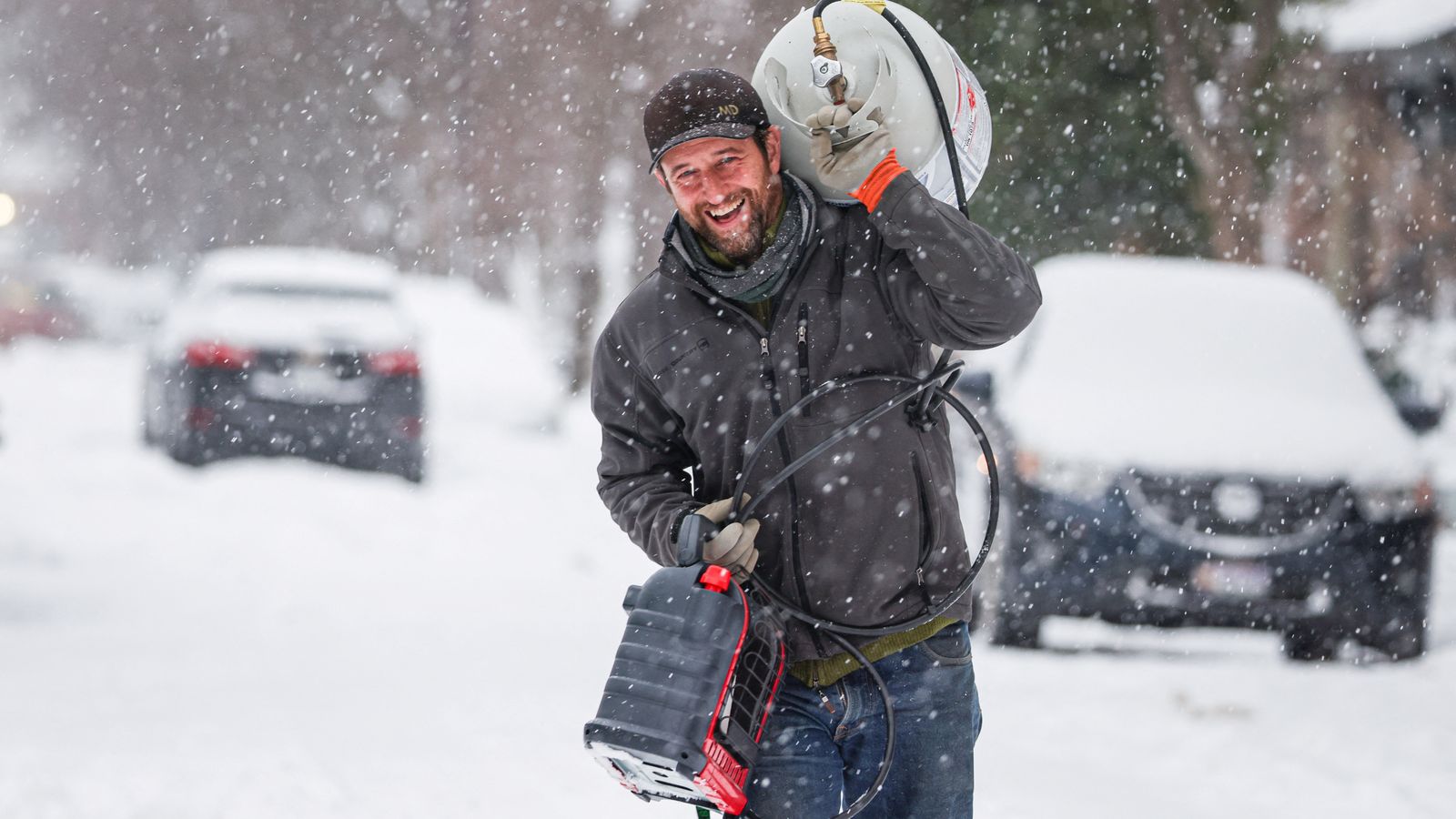 Snowstorms in pictures as several parts of US and Canada battle thick snow and devastating ...