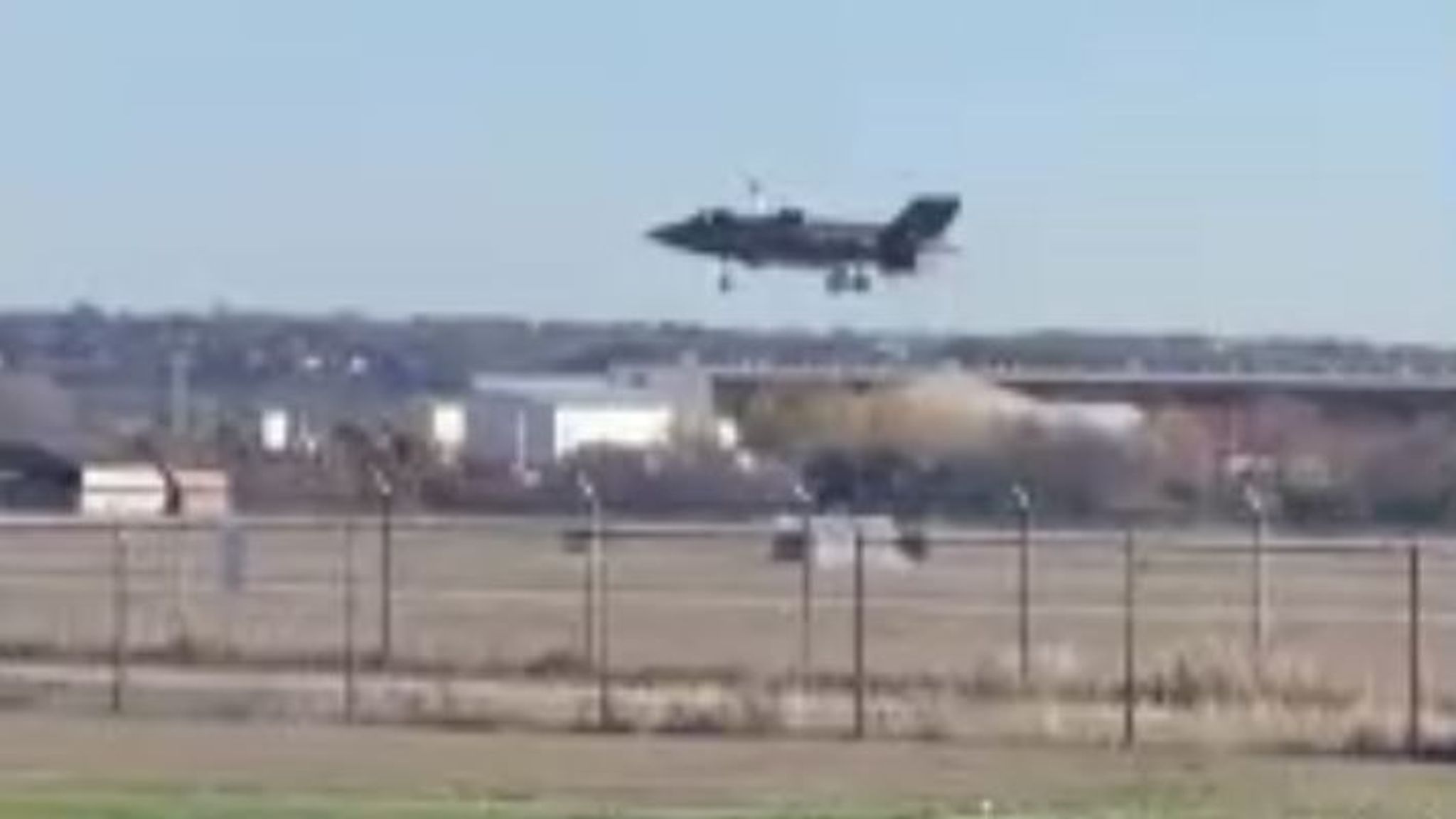 Failed landing sees pilot eject as military jet nosedives on to runway ...