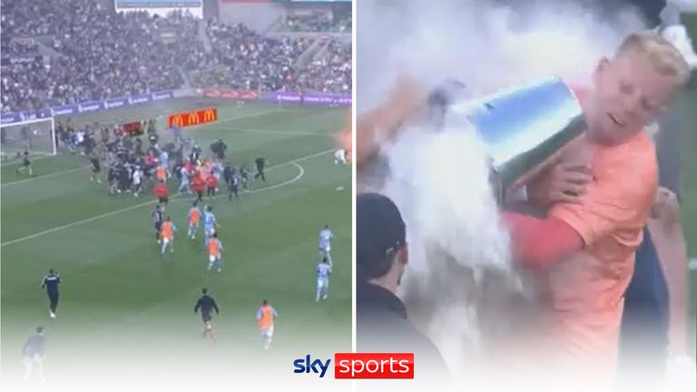Metal bucket hits goalkeeper as Melbourne derby abandoned after pitch ...