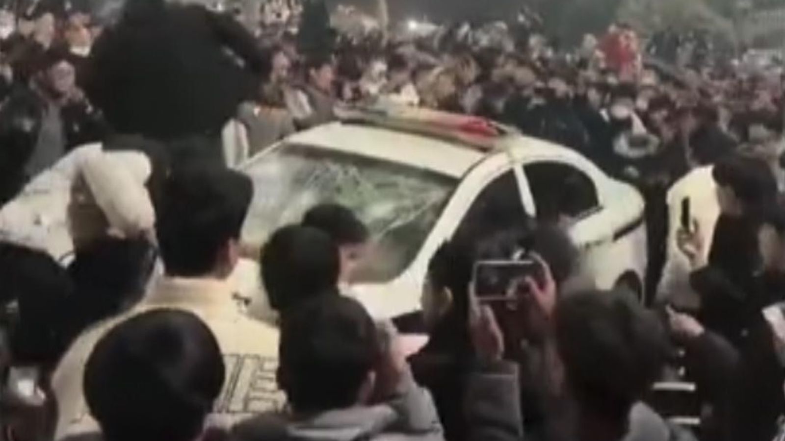 China: Footage of protesters destroying car in Henan shared online ...