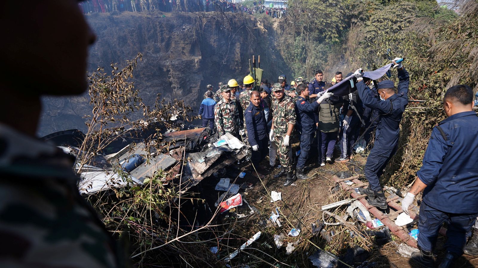 Nepal plane crash: Rescuers resume search as day of mourning observed ...