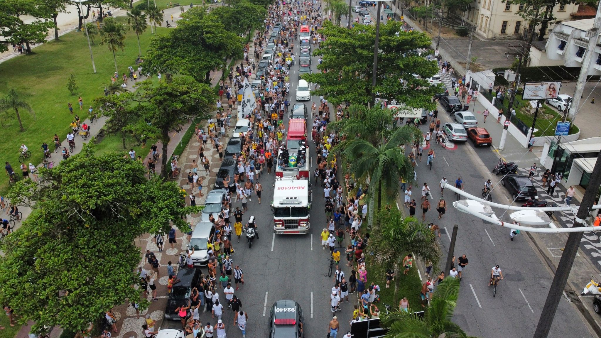 Pele's coffin carried through streets of Santos as public bid final ...