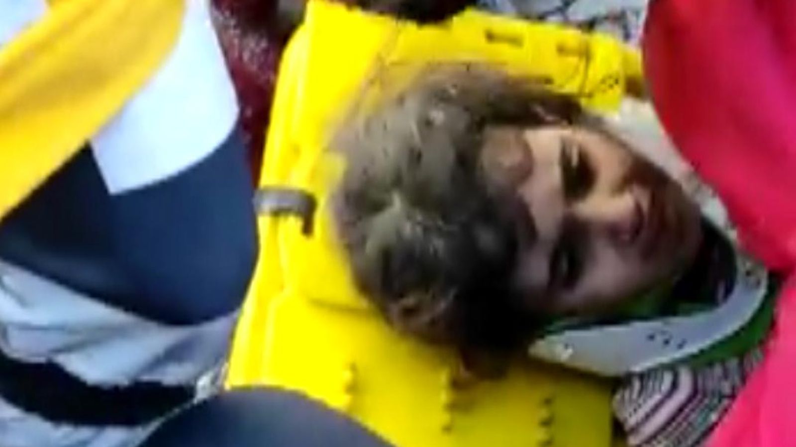 Watch moment rescuers erupt in applause as child pulled alive seven ...