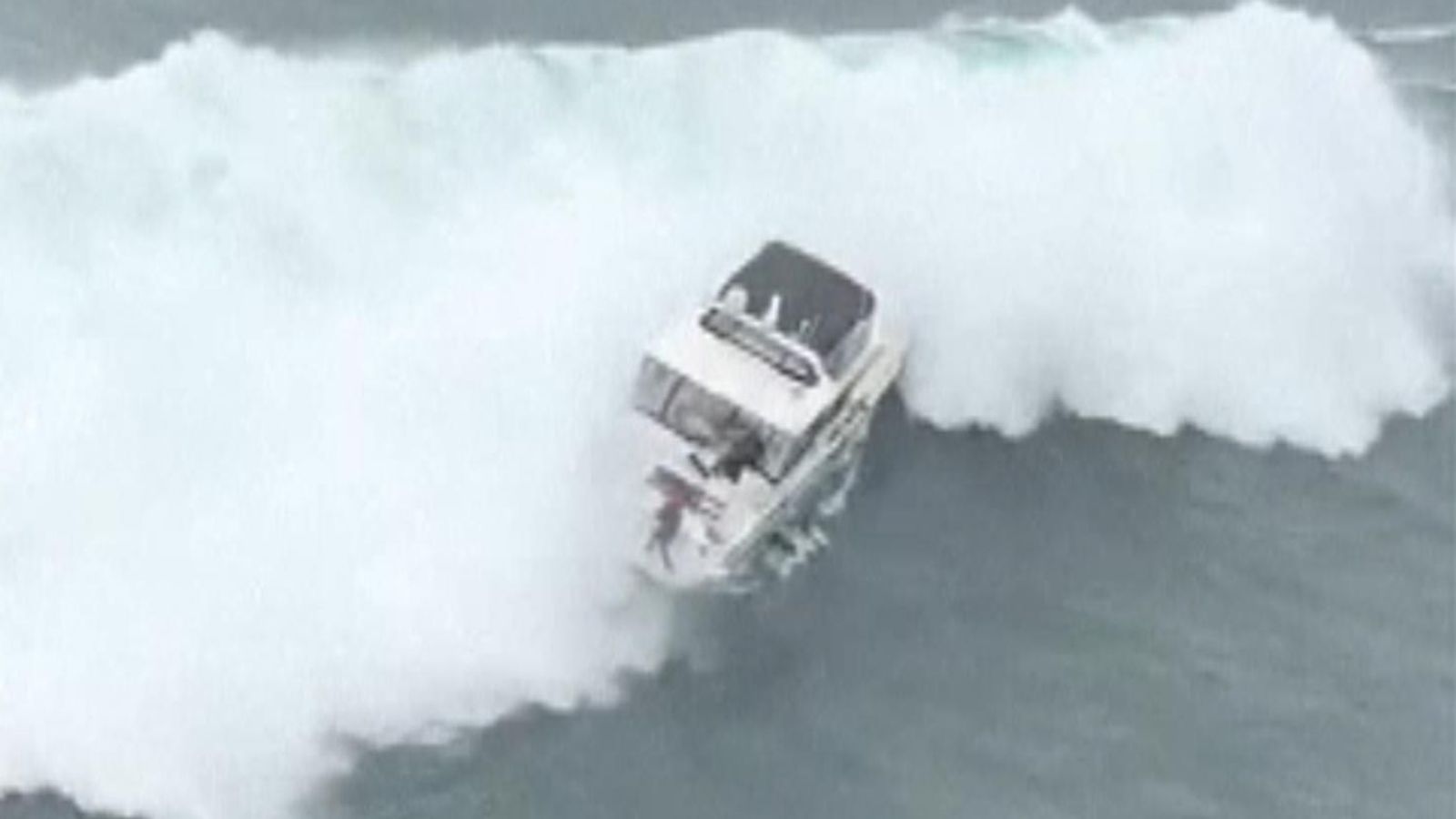 US Coast Guard saves man's life after giant wave rolls his yacht ...