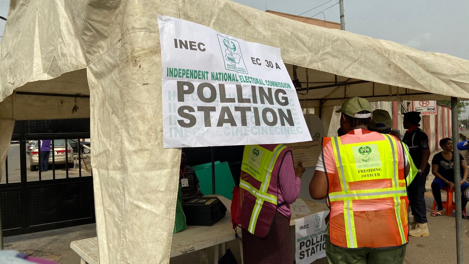 Nigeria election: Crowds chant 'let us vote' after unexplained delays at polling units as they ...