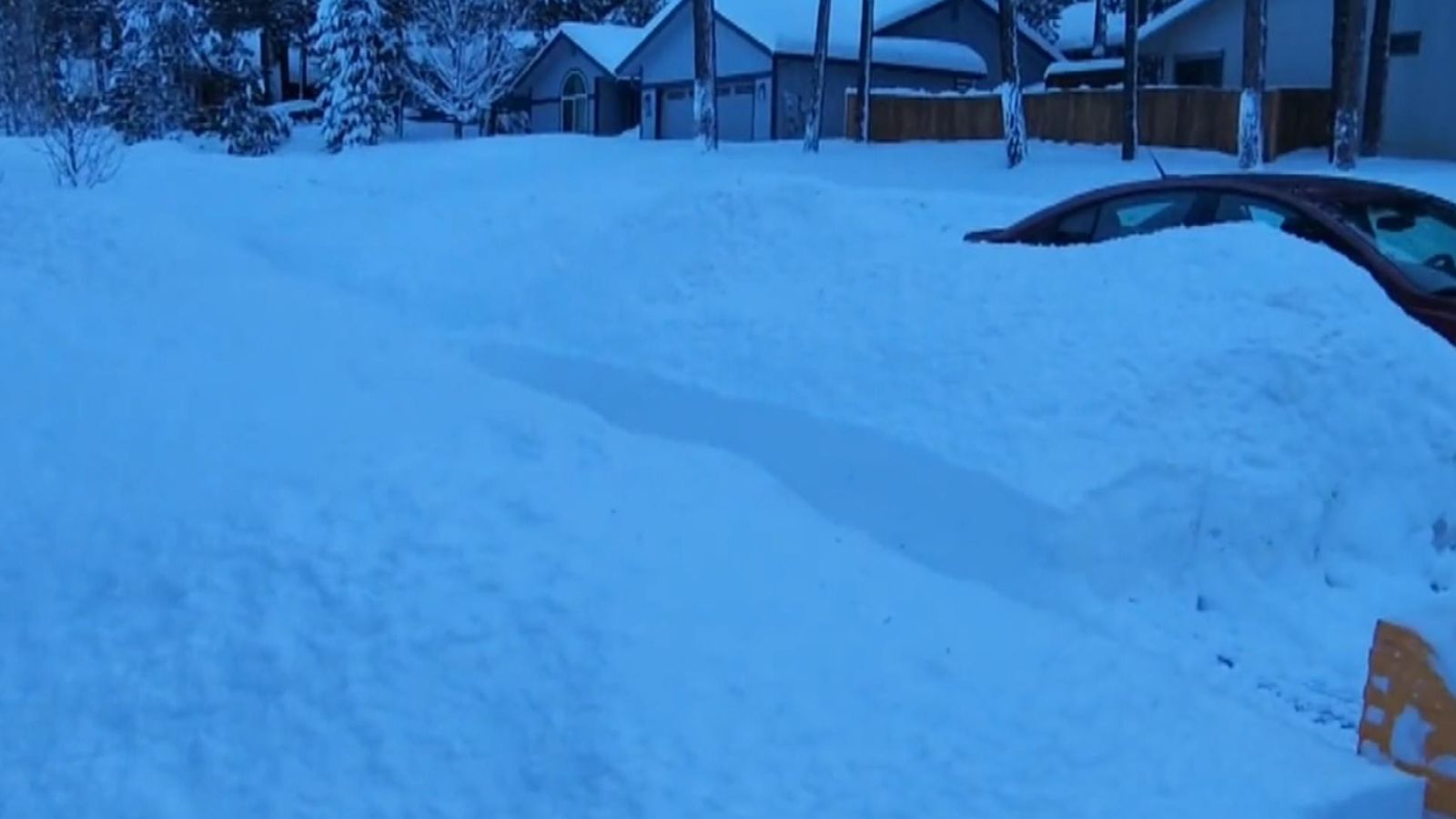 Over 11ft of snow falls in Arizona while in California, property is ...