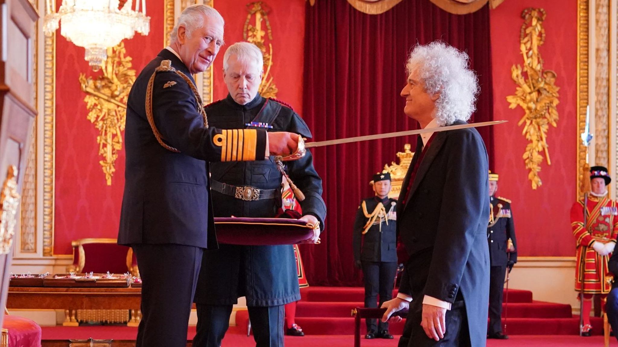 Brian May knighted: Queen star jokes that his knees 'just about' held ...