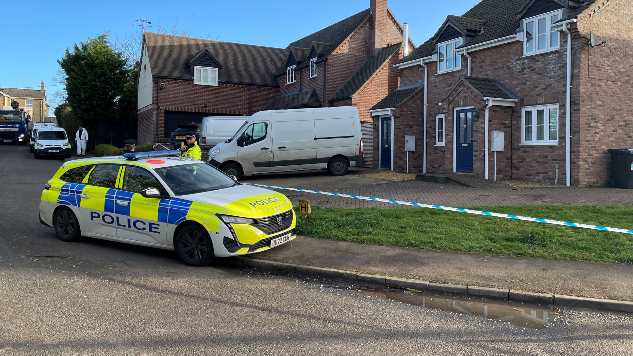 Man charged with murder after father and son shot dead in ...