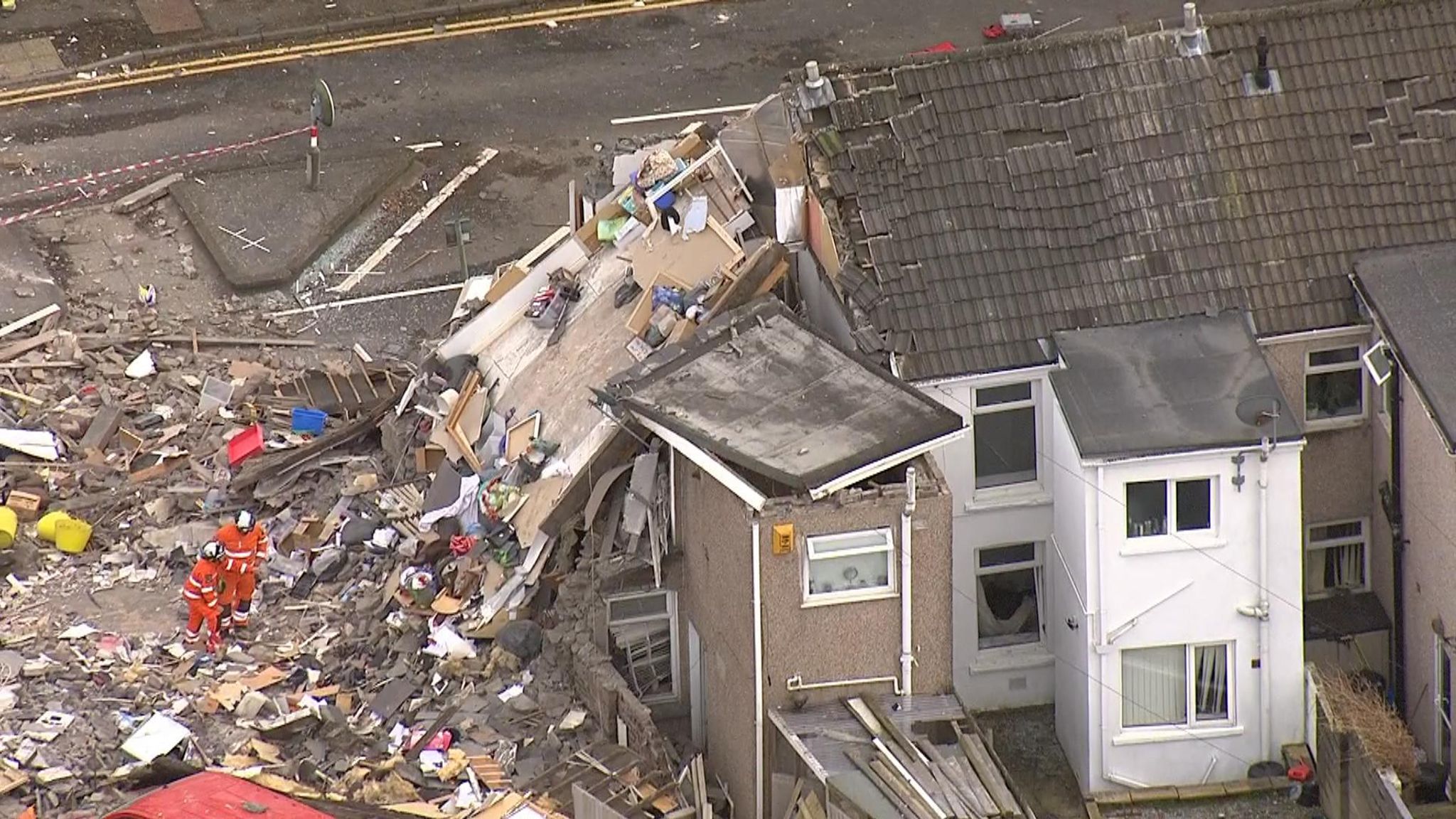 One dead and three in hospital after suspected gas explosion in Swansea ...