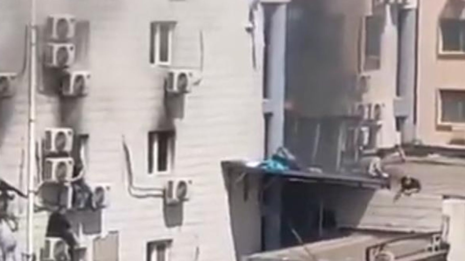 Beijing: Patients climb out of windows trying to escape hospital fire ...