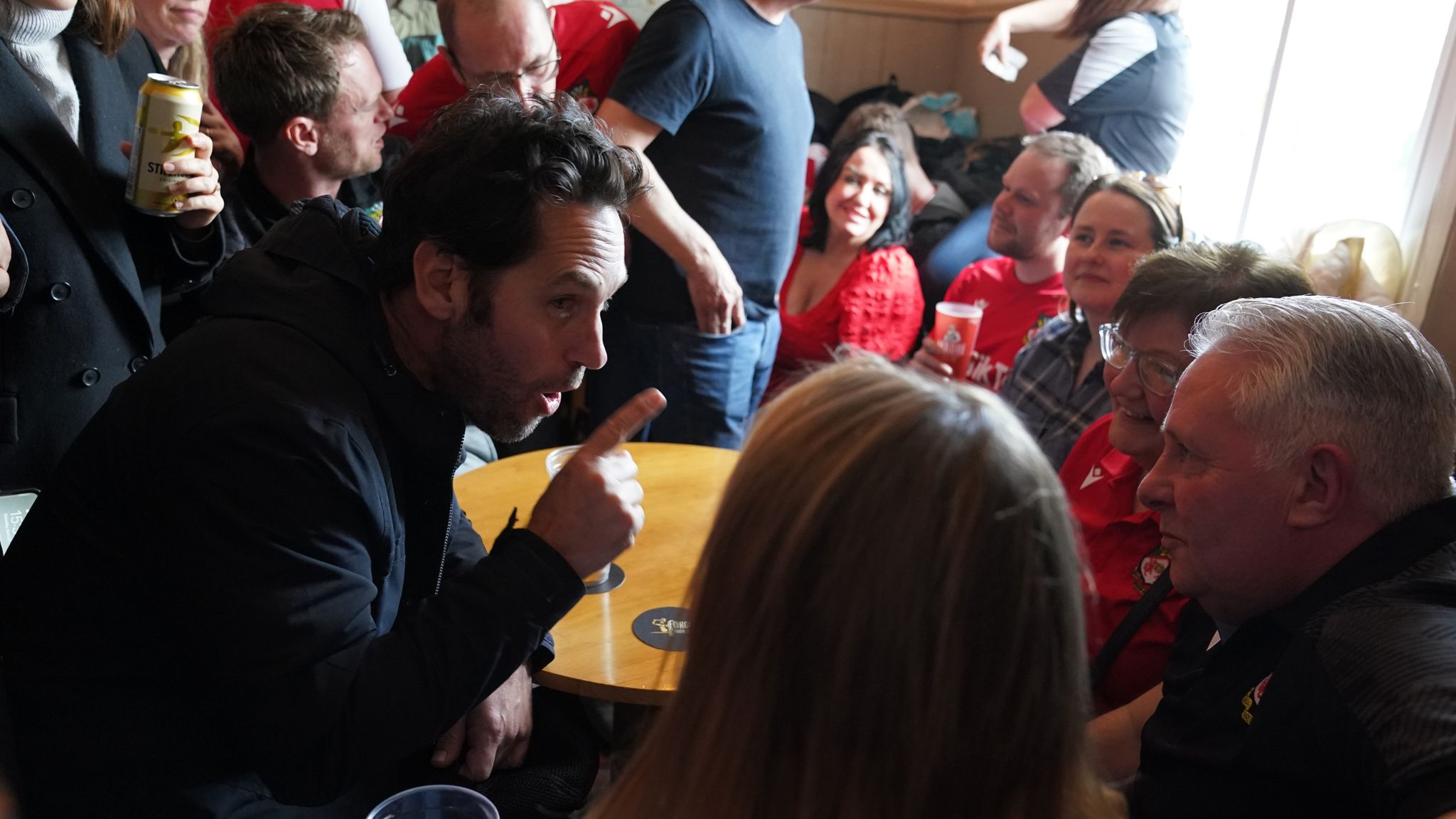 Wrexham: Hollywood star Paul Rudd drinks beer and sings with fans ahead ...
