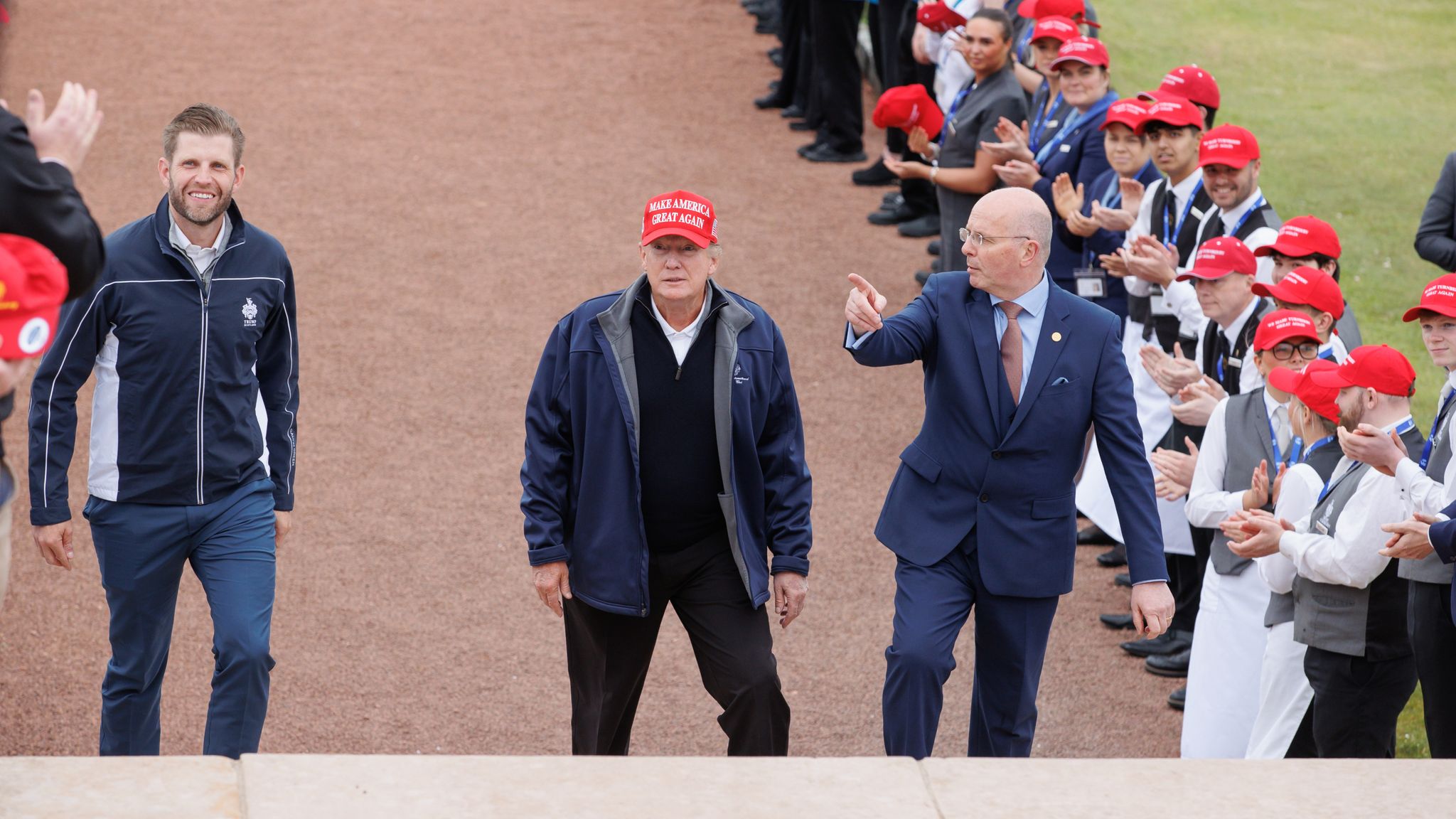 Donald Trump greeted by hat-waving workers at Turnberry golf resort ...