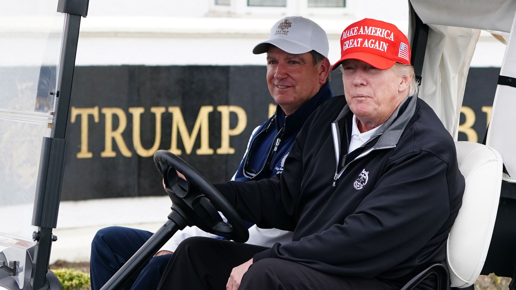 Donald Trump greeted by hat-waving workers at Turnberry golf resort ...