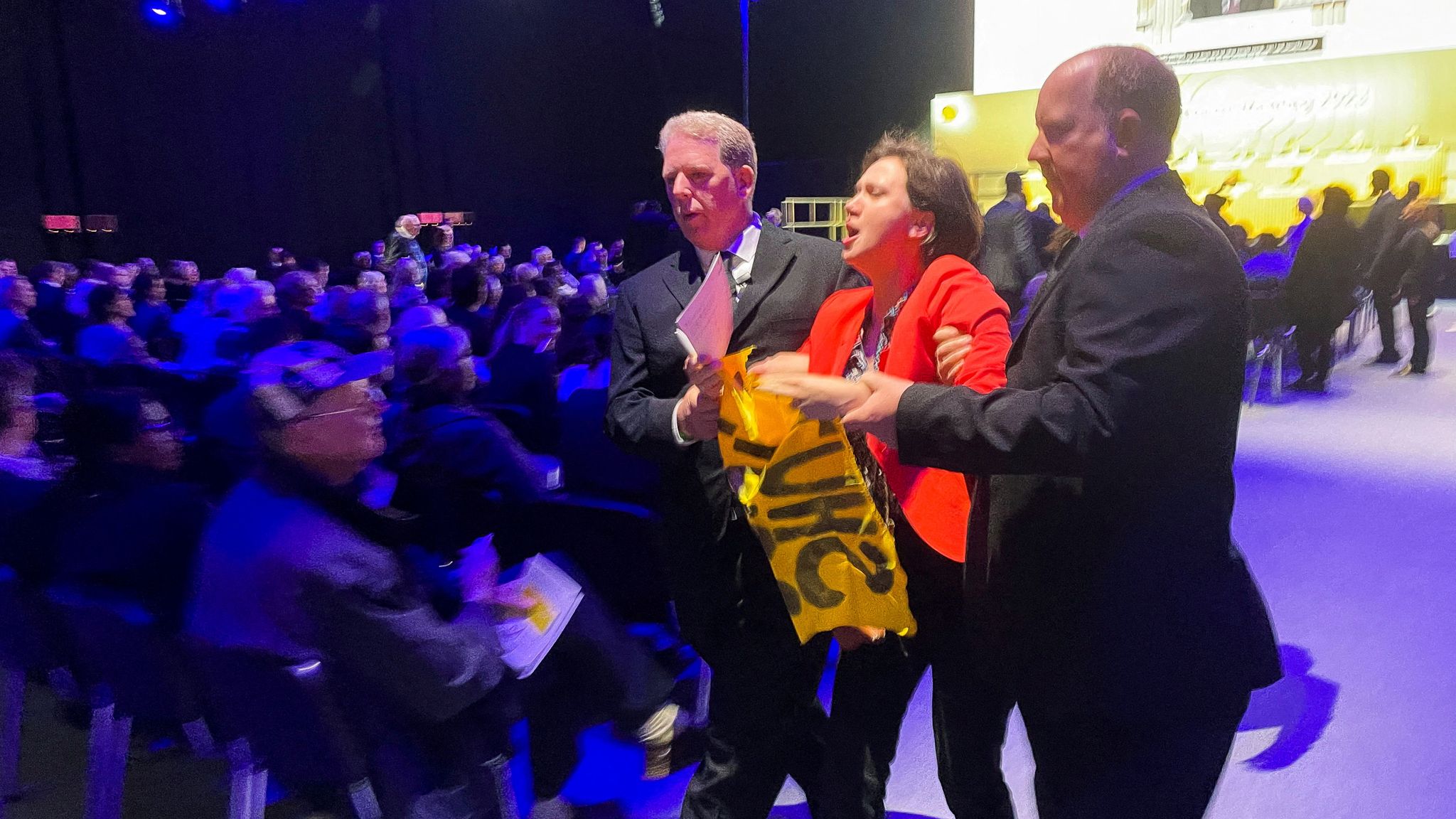 Climate change protesters try to storm stage at Shell AGM | Sky News