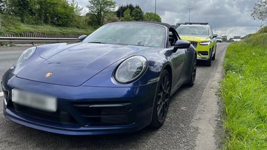 Porsche courtesy car spotted by police racing a BMW at more than 140mph ...