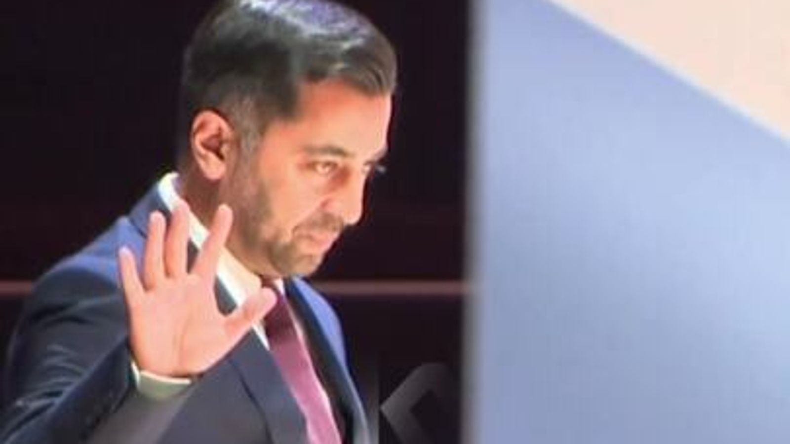 Scottish First Minister Humza Yousaf leaves stage to speak to heckler ...