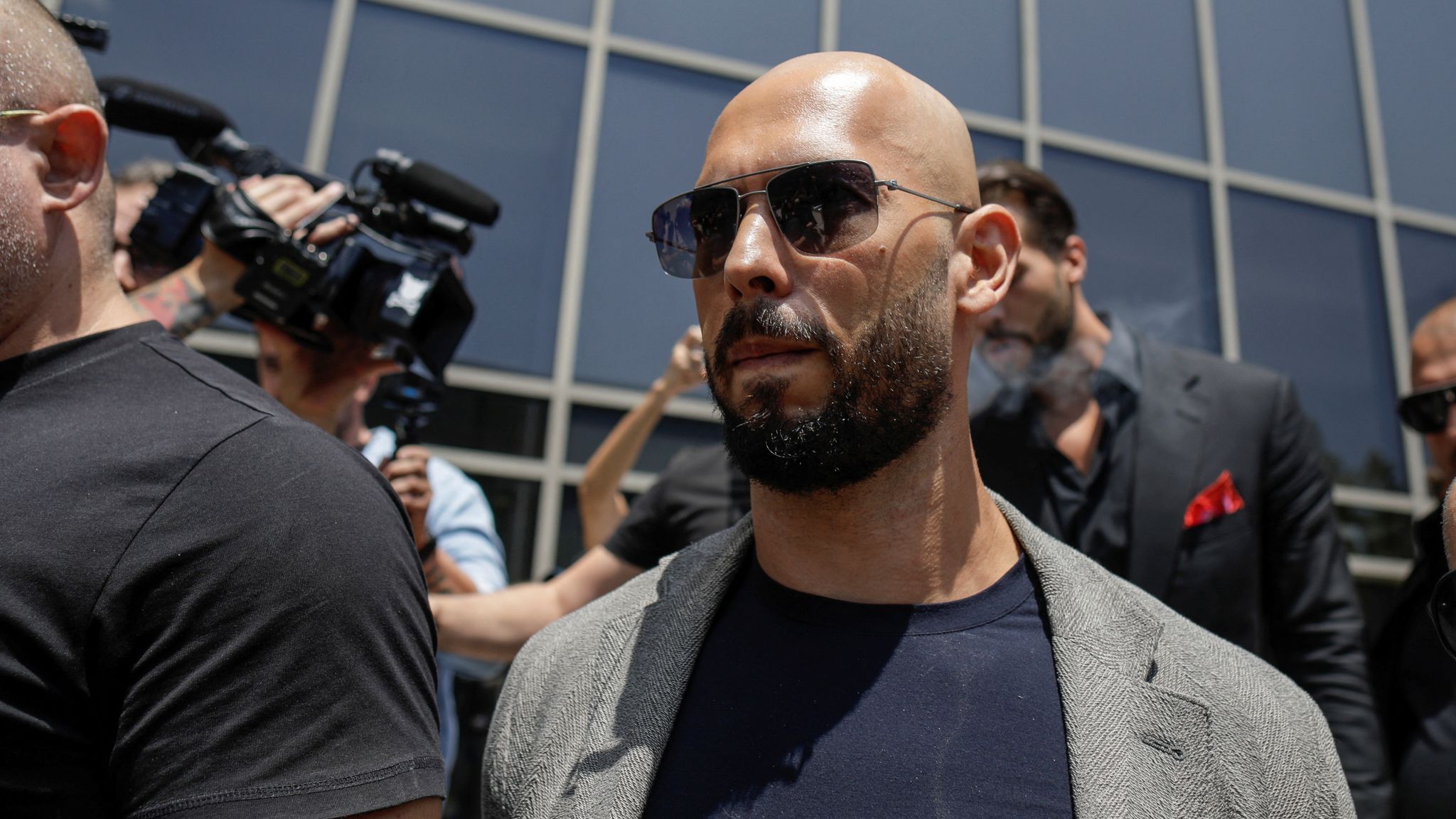 Andrew Tate sues woman who accused him of human trafficking | World News | Sky News