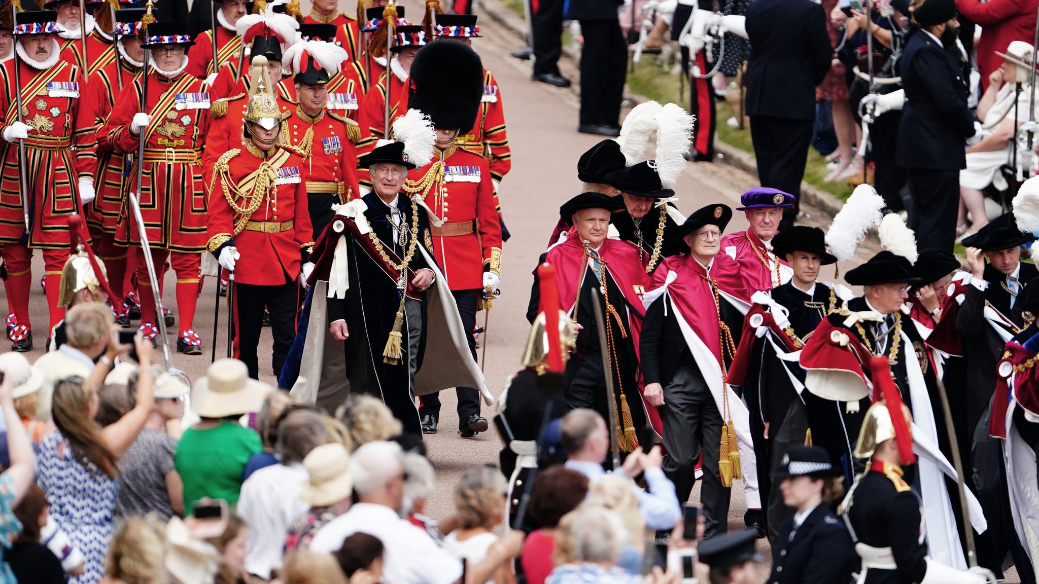 Soldier helped by police after fainting at King's first Order of the ...