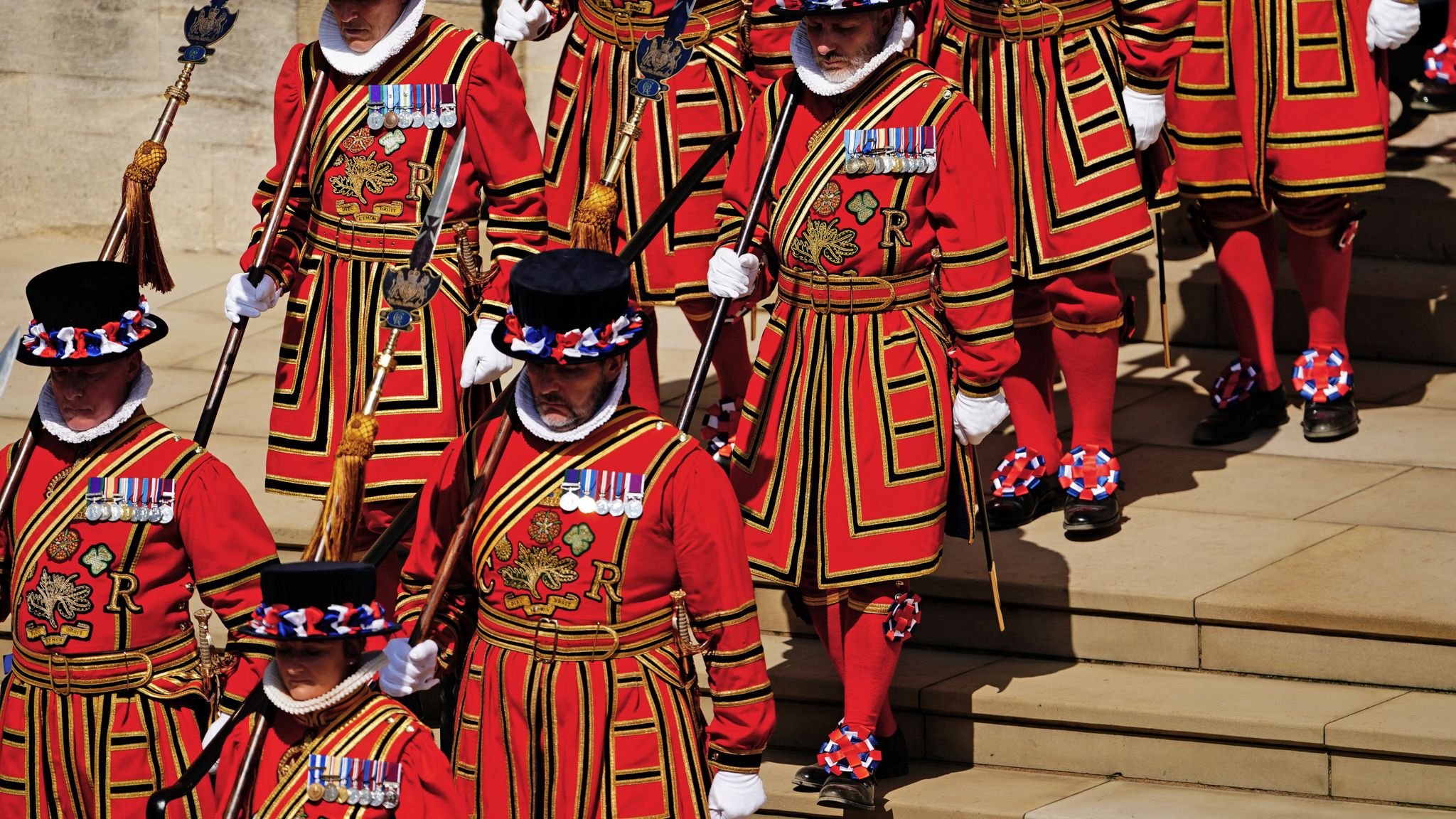 Soldier helped by police after fainting at King's first Order of the ...