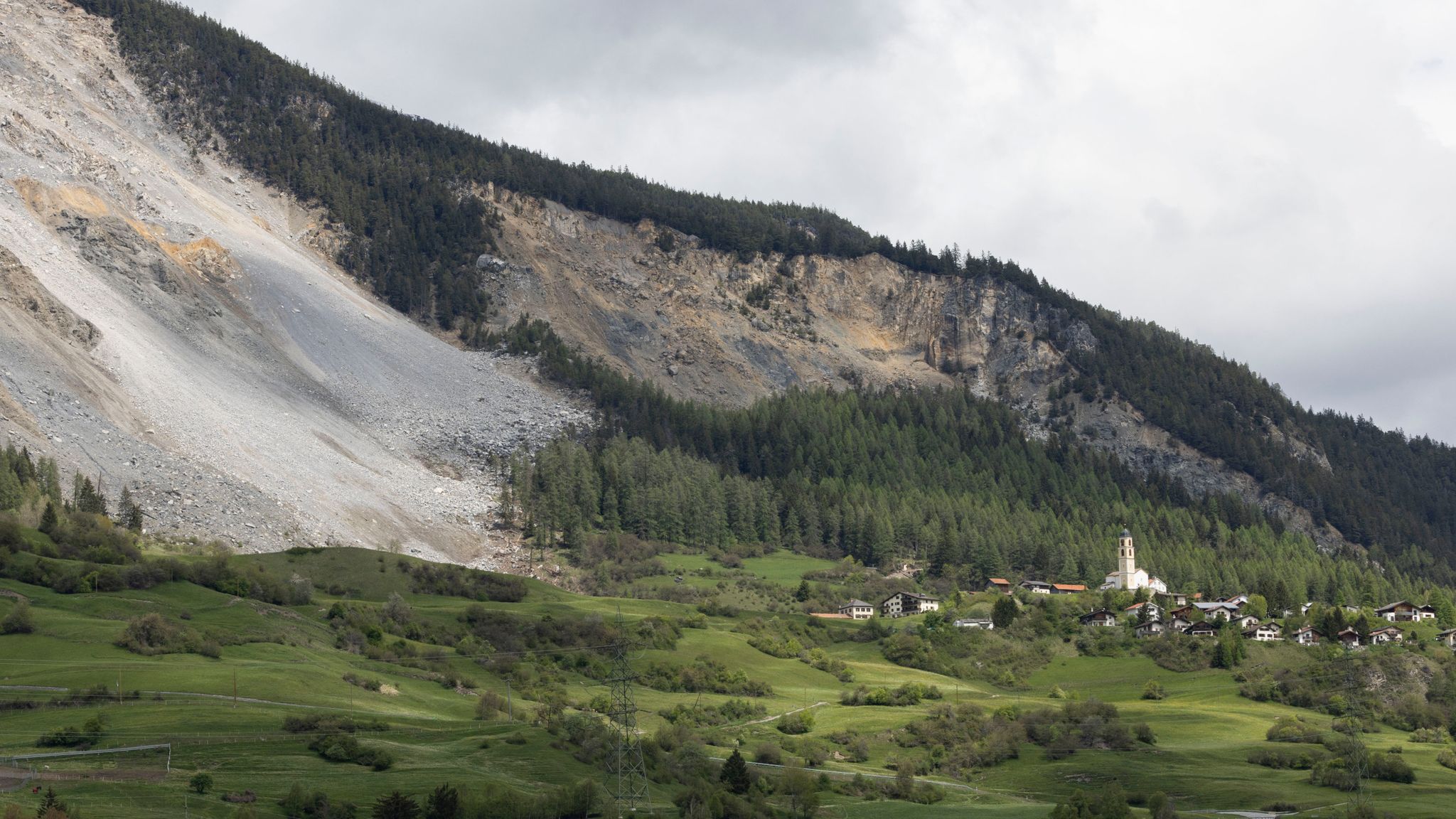 Narrow escape for Swiss village as huge rock slide stops just short of ...