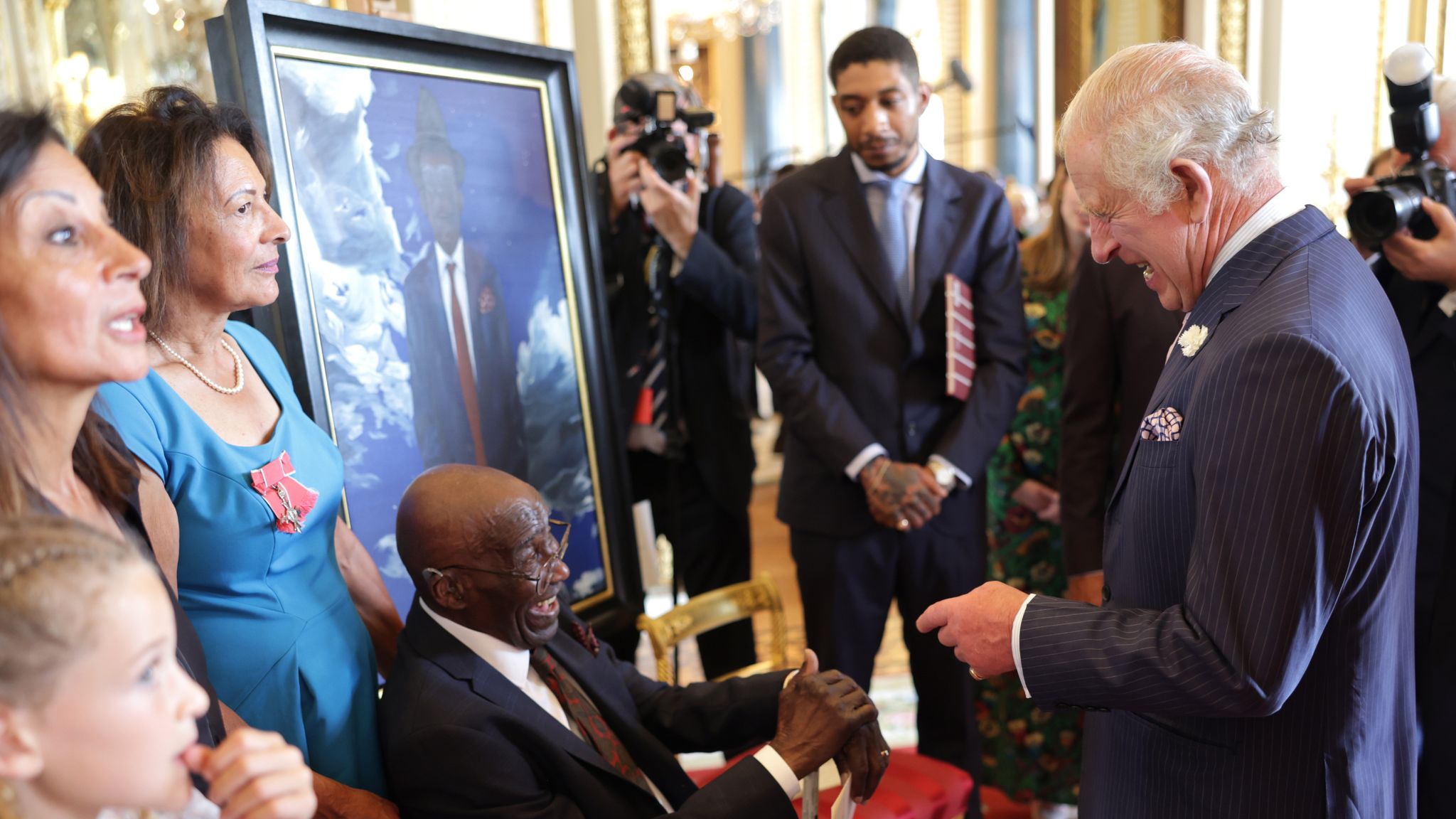 'Remarkable legacy' - King honours Windrush generation with portraits ...