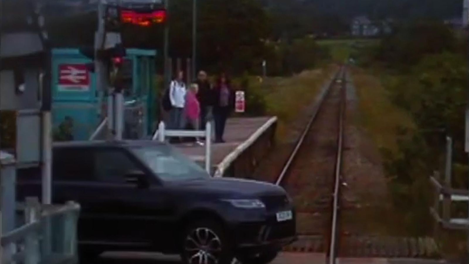 CCTV shows man drive Range Rover across railway tracks in front of oncoming train in Gwynedd ...