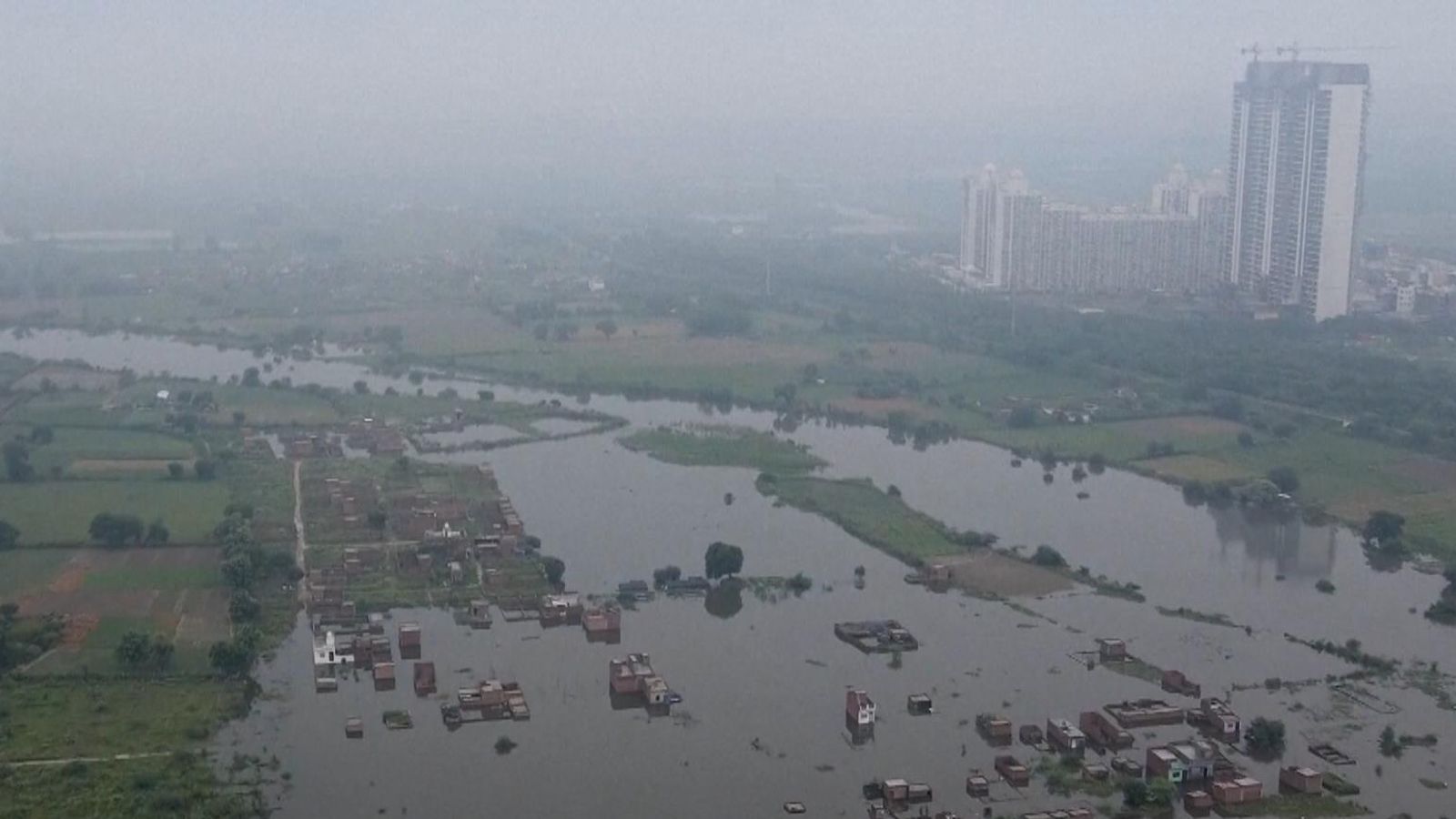 India Floods: Drone footage shows farmland submerged in water | World ...