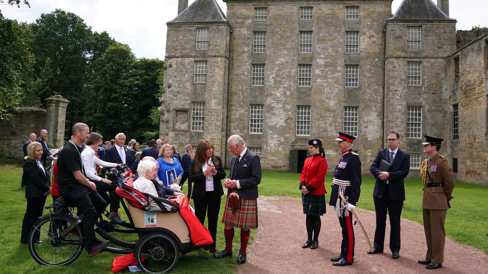 The King meets young 'queen' on his first Scottish visit post ...