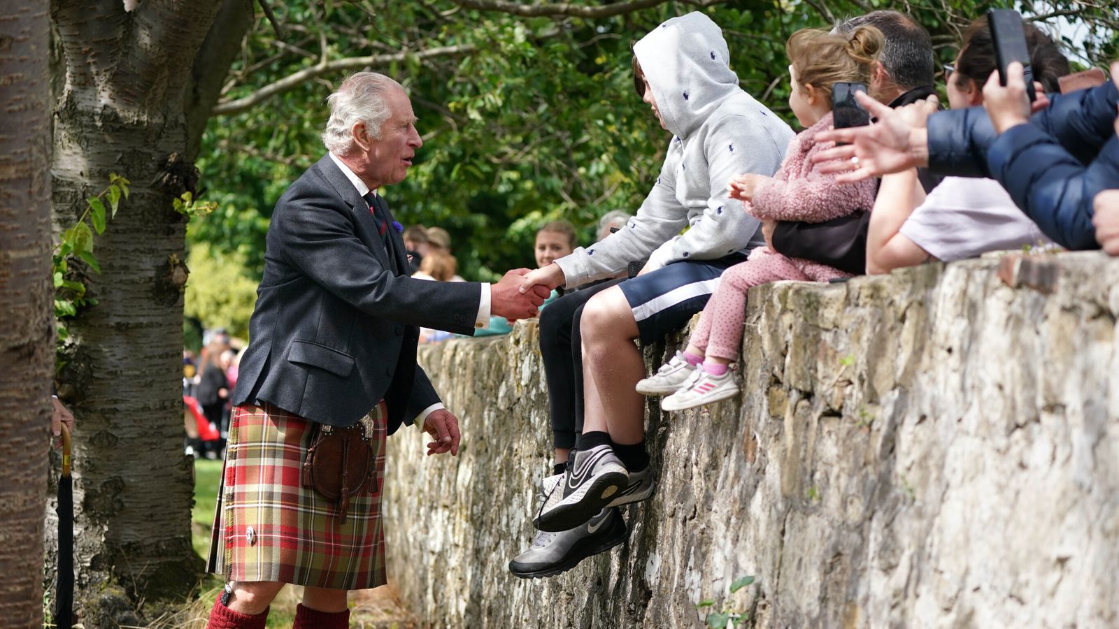 The King meets young 'queen' on his first Scottish visit post ...