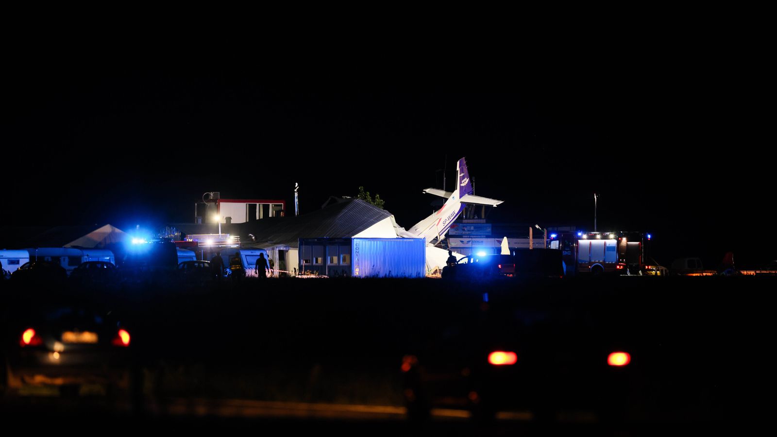 Poland: Five killed after plane crashes into hangar where people were ...