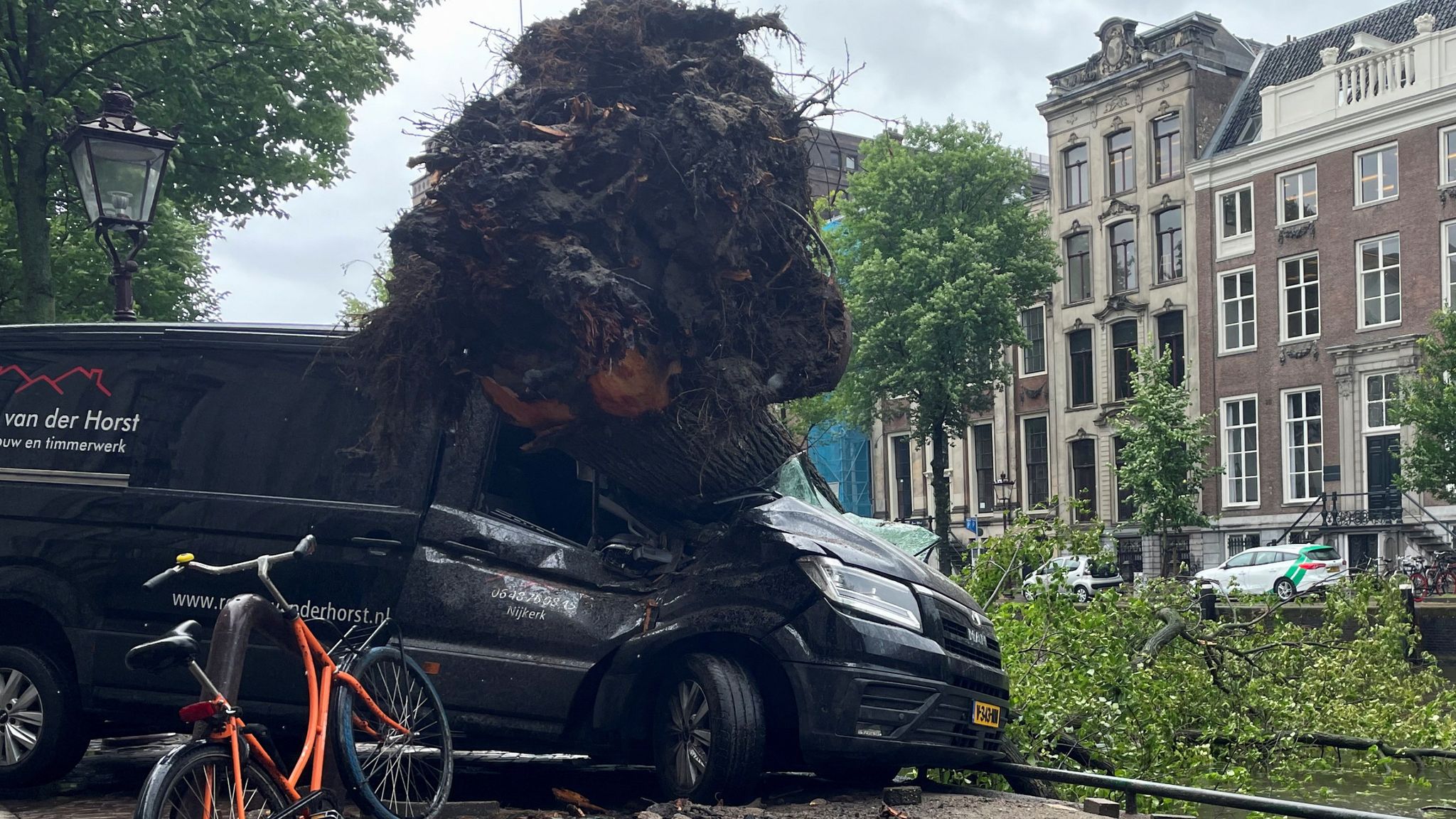 Two dead as Storm Poly hits Netherlands and 'code red' weather alert ...