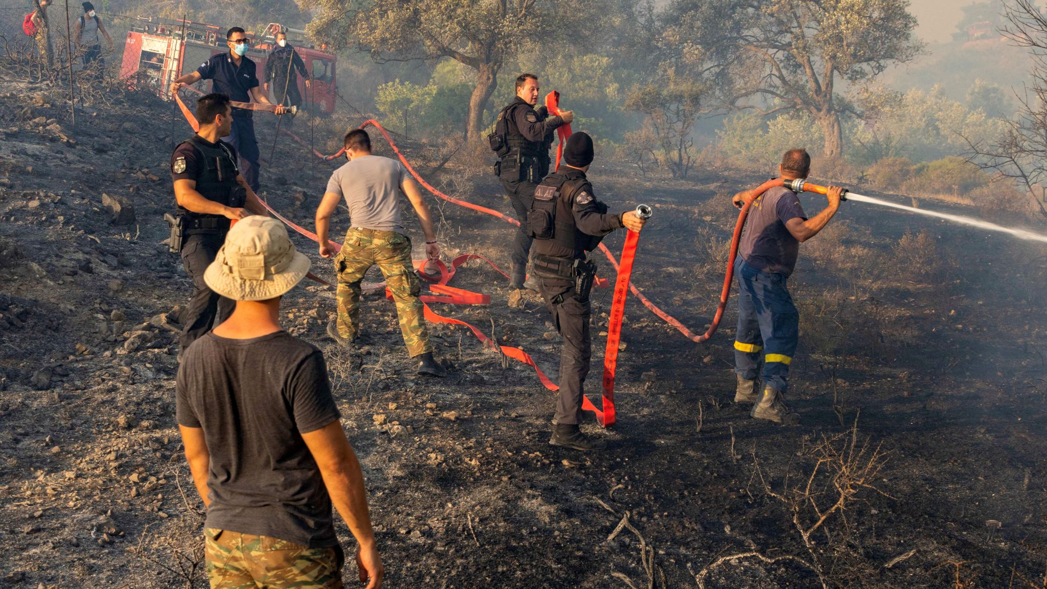Pictures show the terror of wildfires in Greece, Rhodes and Corfu: 'The ...