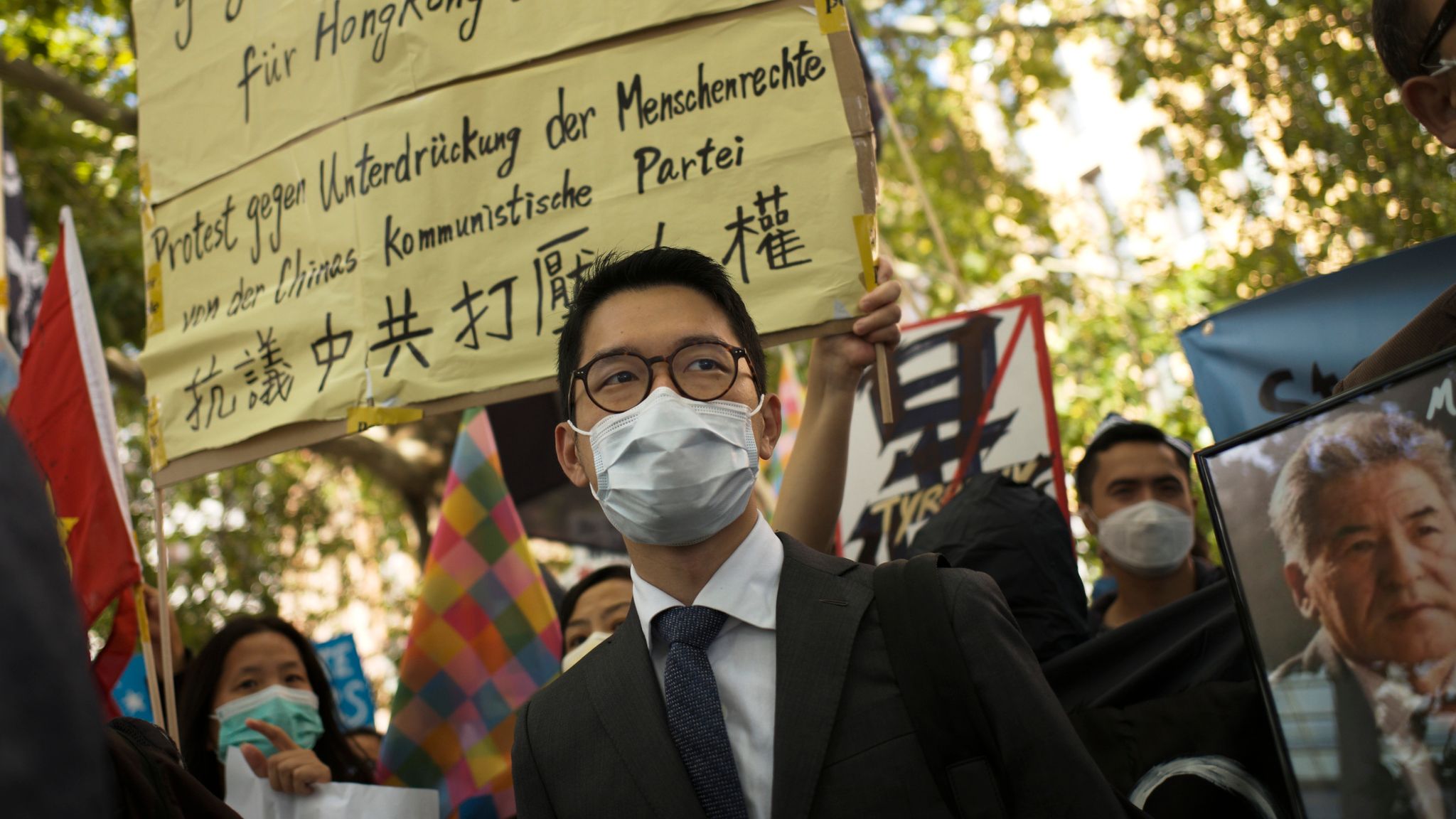 UK vows to defend exiled Hong Kong activists after arrest warrants ...