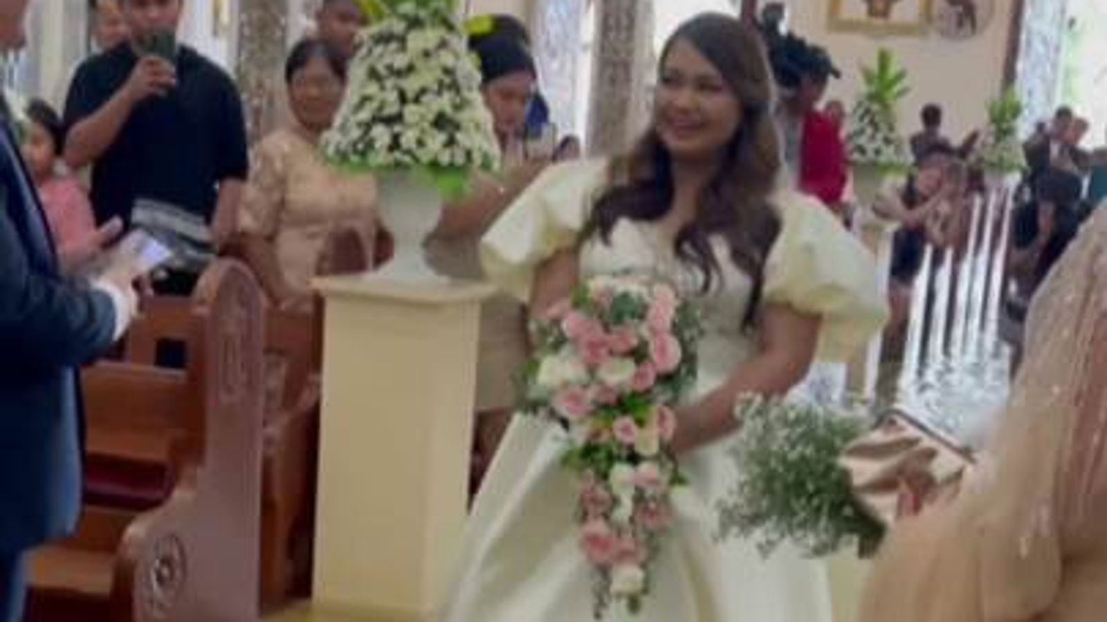 Typhoon Doksuri: Bride in the Philippines wades through floodwater up ...