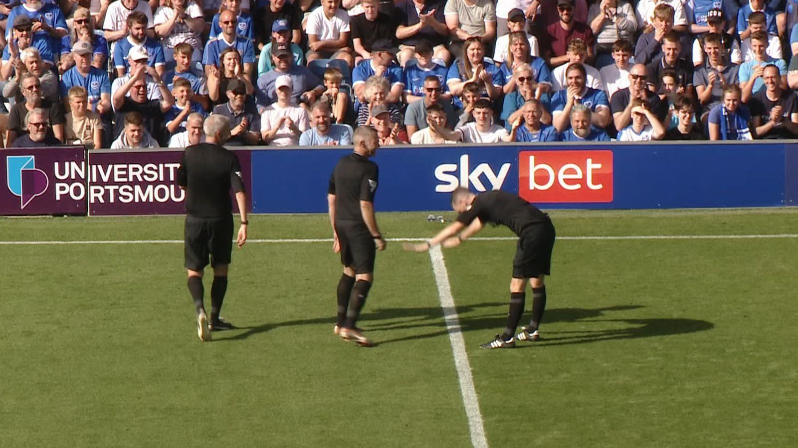 Fan steps in as assistant referee after two officials injured in League ...