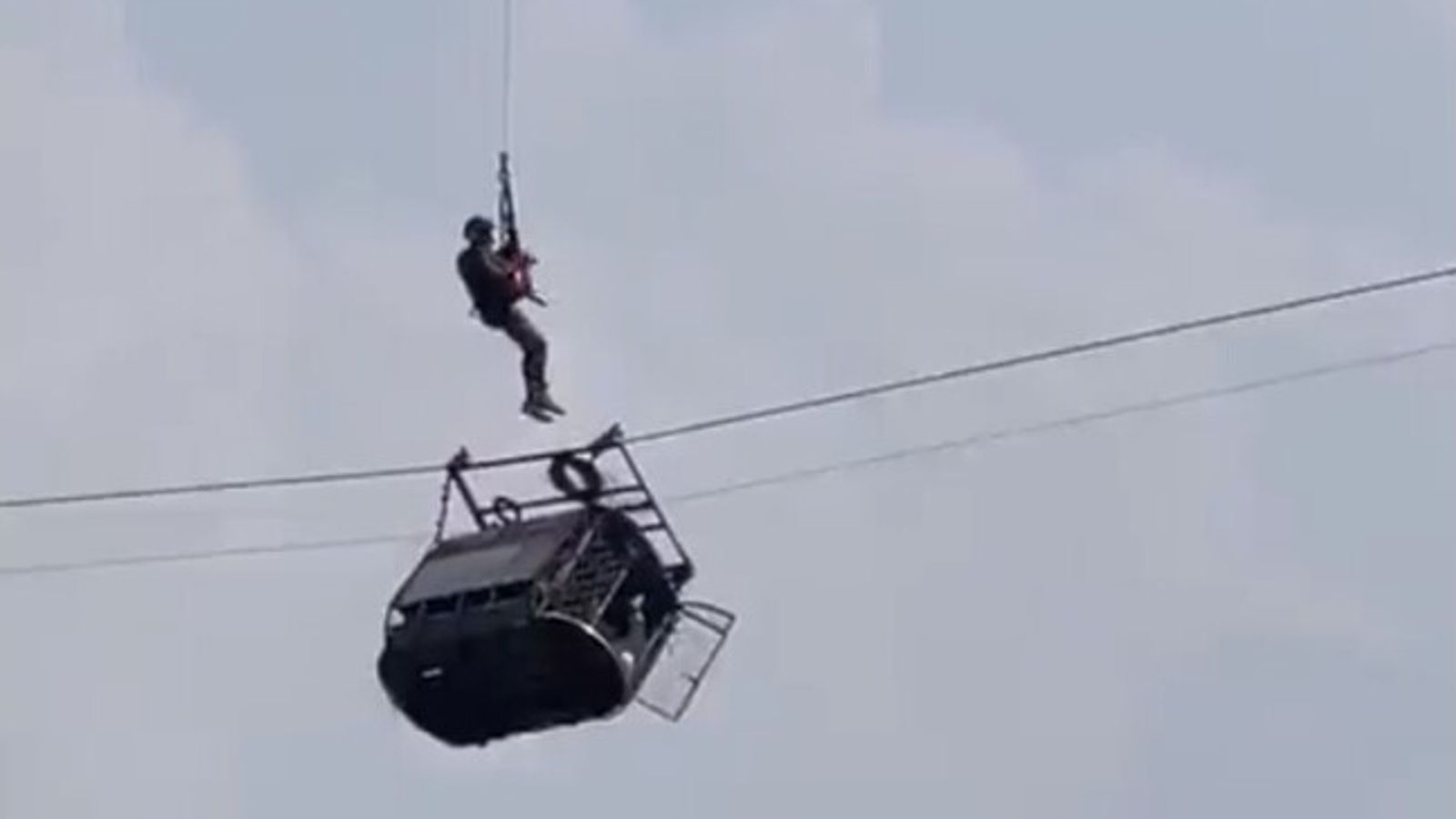 Pakistan: All eight people rescued from broken cable car dangling 274m above canyon | World News ...