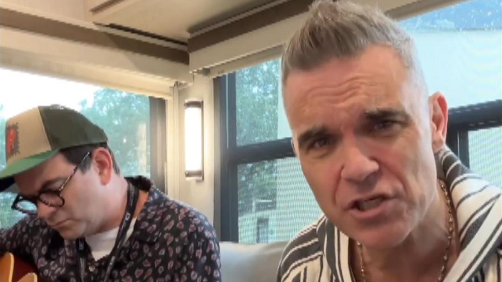 Robbie Williams sings new version of hit song 'Angels' - about Spurs ...