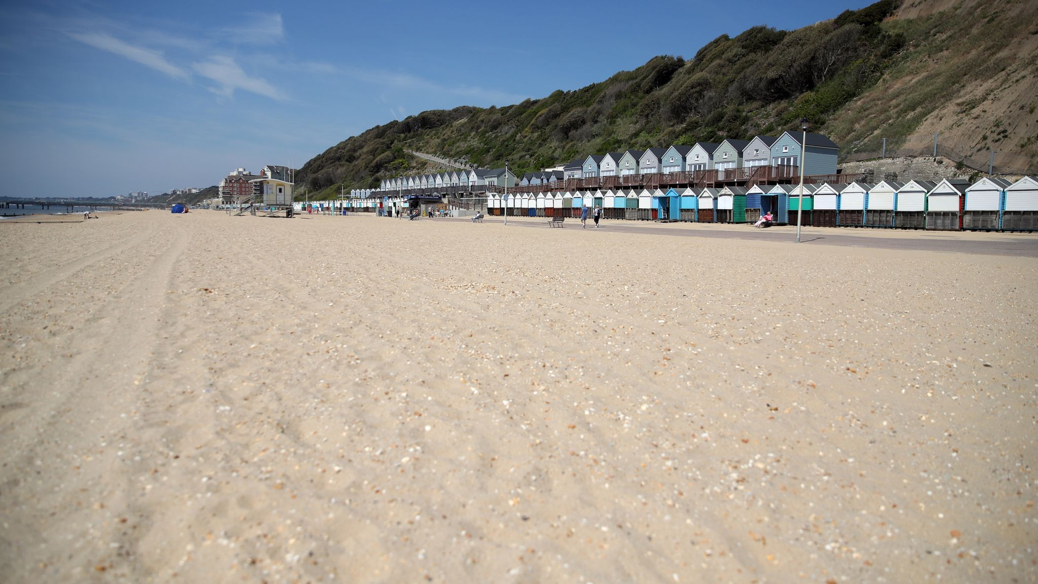 Bournemouth murder investigation after human remains found off cliff ...