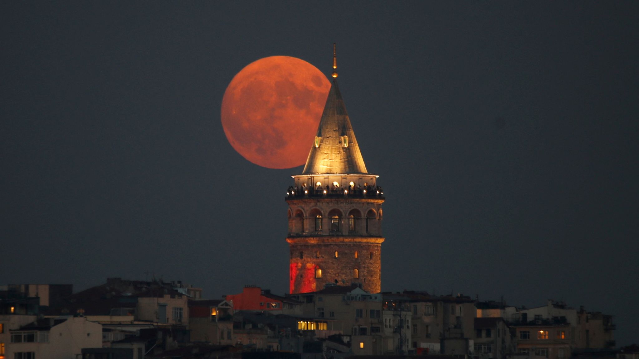 Blue supermoon: Stunning pictures capture lunar event around the world ...